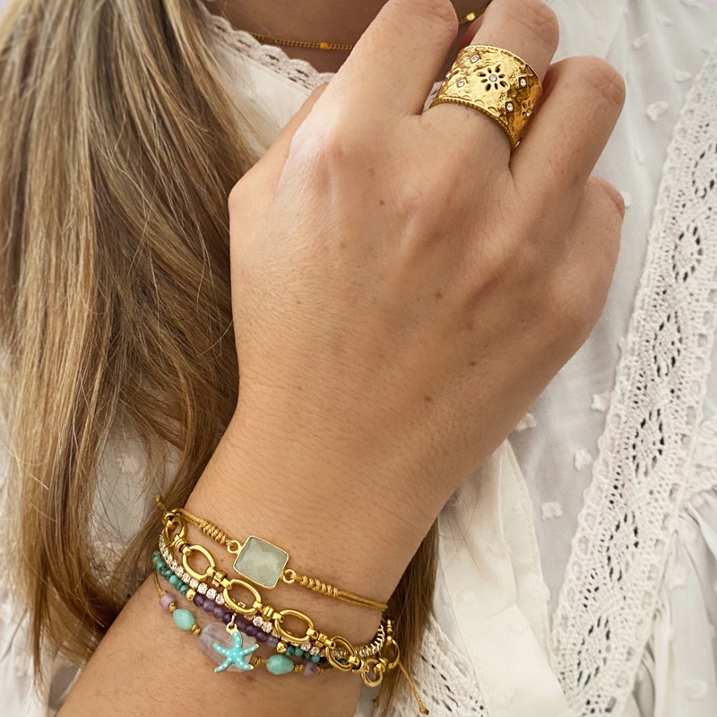 Pulsera de cadena de eslabones ovalados con anclajes de acero dorado
